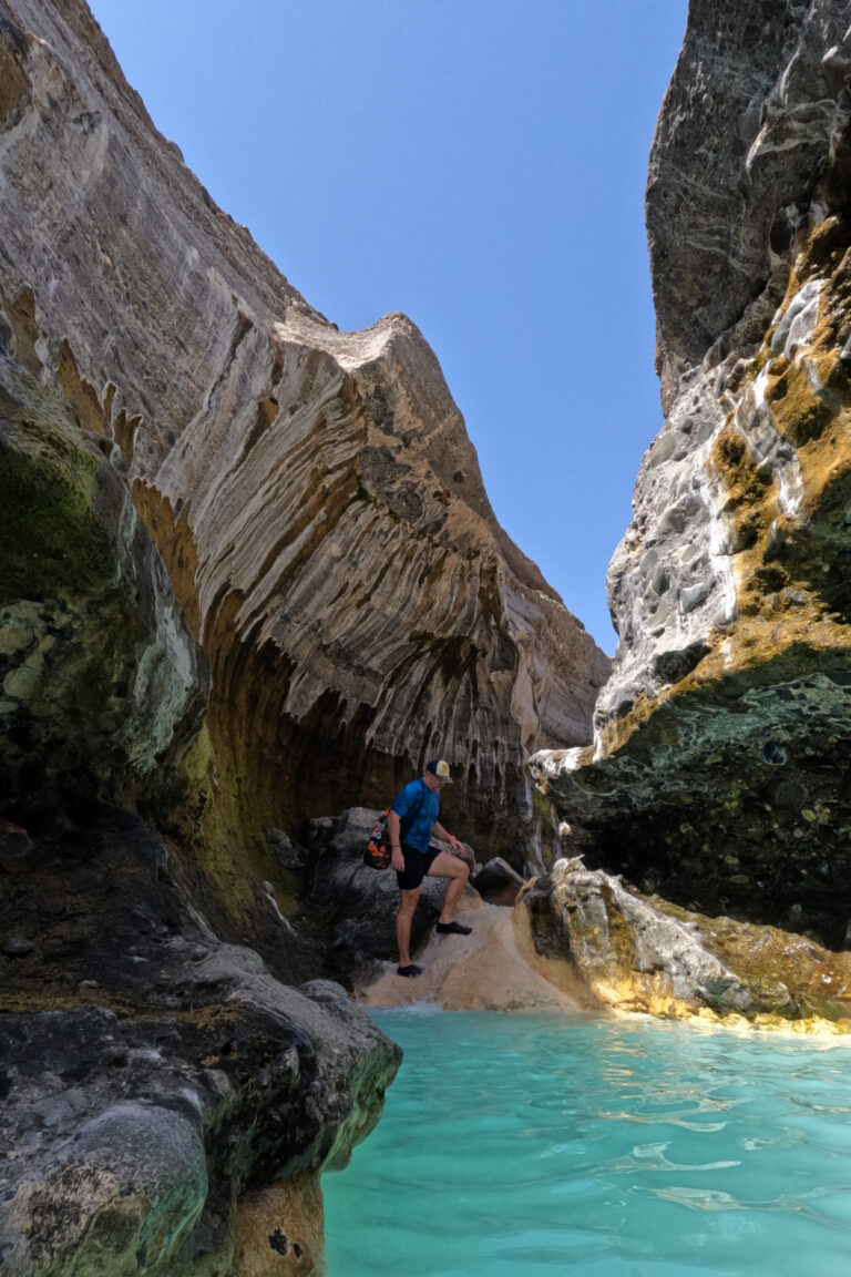 Wadi Hoqain - blue pools and waterfalls near Muscat - Oman Wanderlust